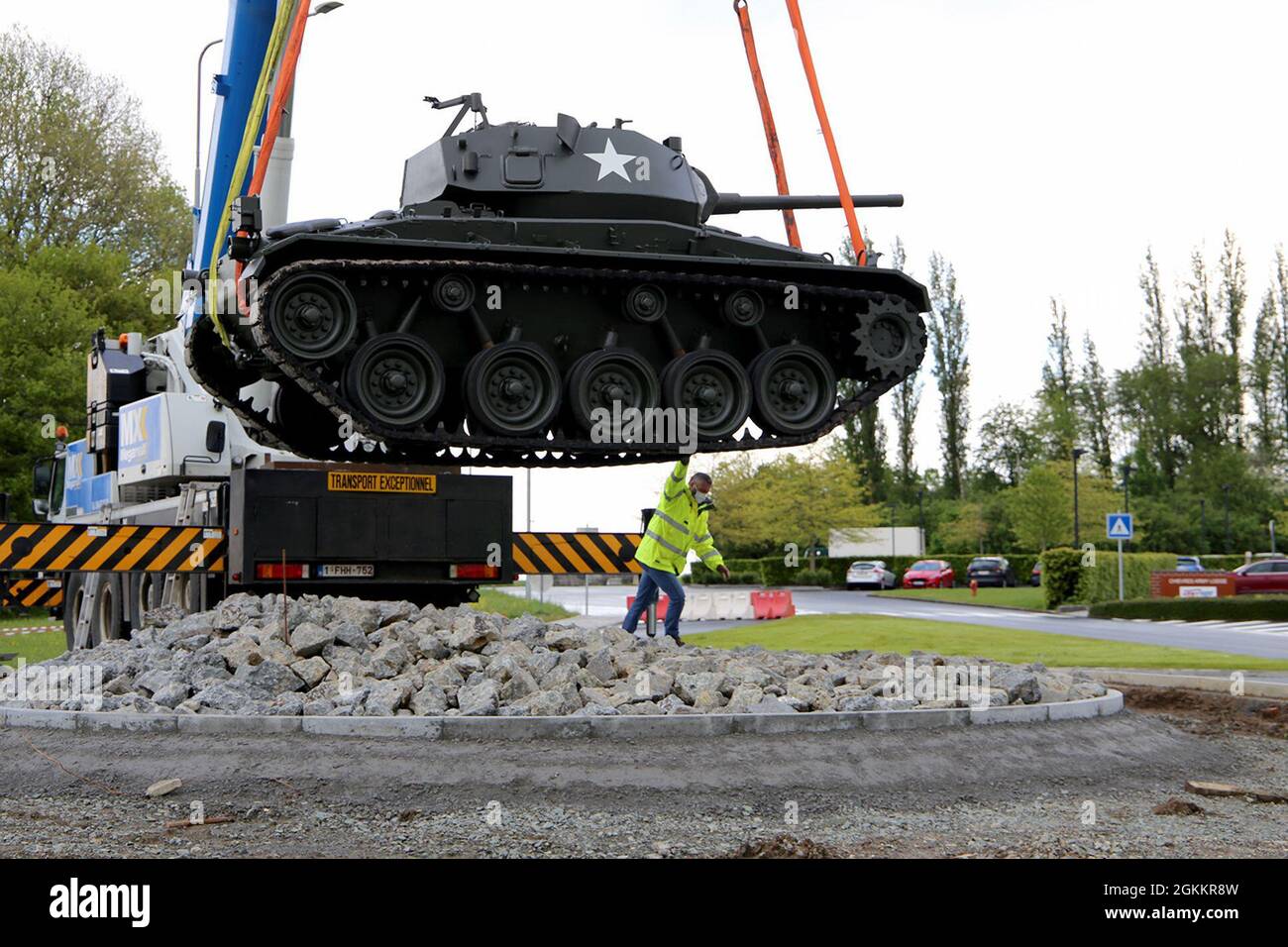 U.S. Army Garrison Benelux personnel install a U.S. Army M24 "Chaffee ...
