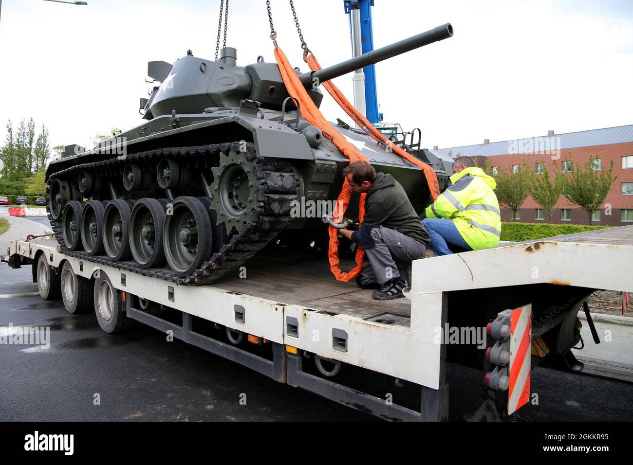 U.S. Army Garrison Benelux personnel install a U.S. Army M24 "Chaffee ...