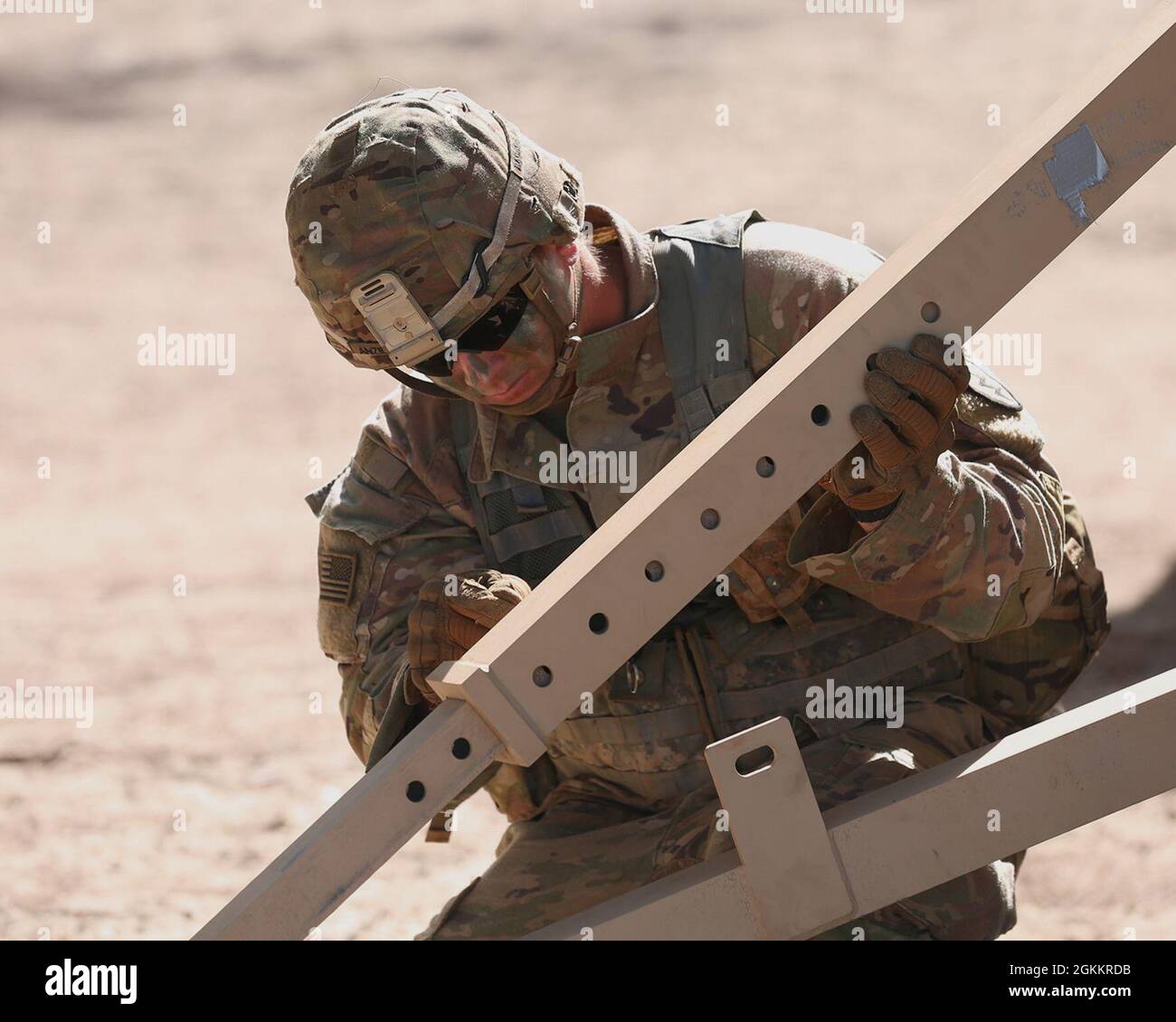 Soldiers work together during the Signal Digital Gunnery Table exercise ...