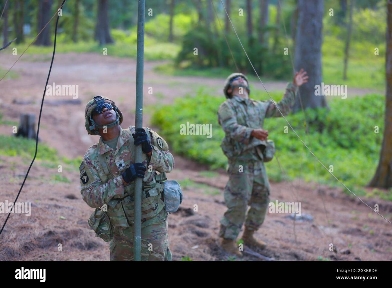 A Soldier holds an OE-254 during the 25th Combat Aviation Brigade ...