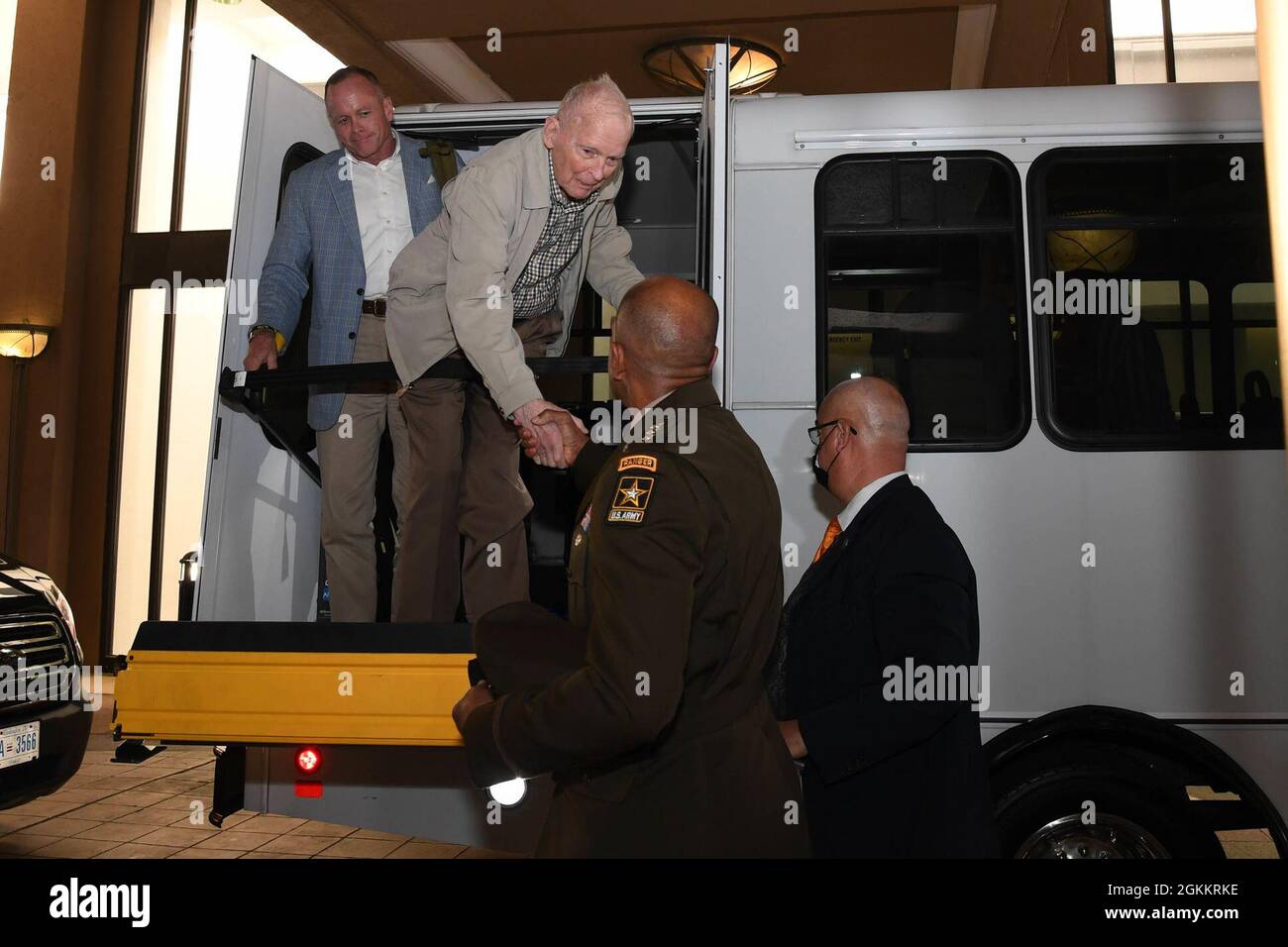 Lt. Gen Gary Brito greets former U.S. Army Col. Ralph Puckett Jr. upon ...