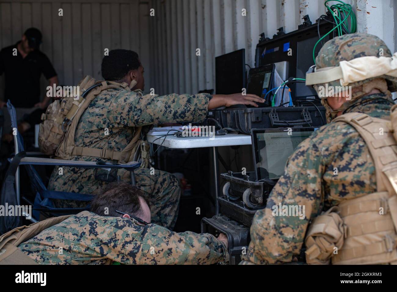 U.S. Marines with the 11th Marine Expeditionary Unit, maintain ...