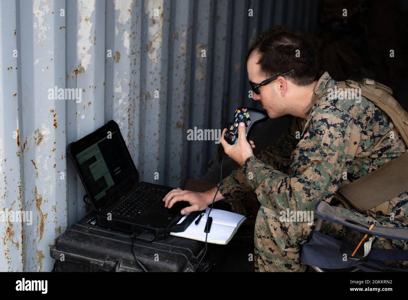 U.S. Marine Corps Cpl. Hudson Poole, an unmanned aerial systems ...