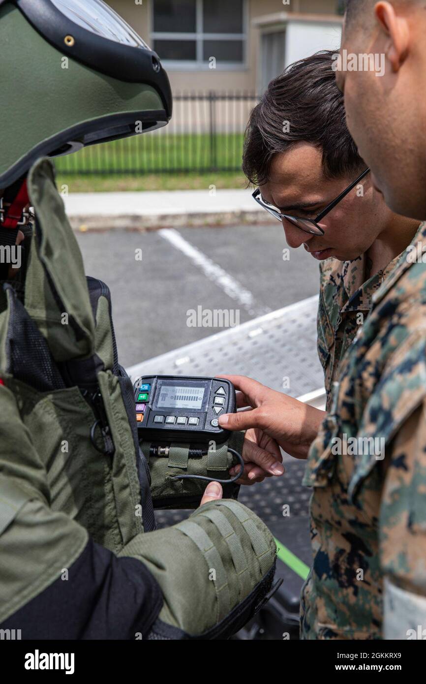 U.S. Marine Corps Staff Sgt. Kevin Syphanthavong, (Left), Sgt. Anthony ...