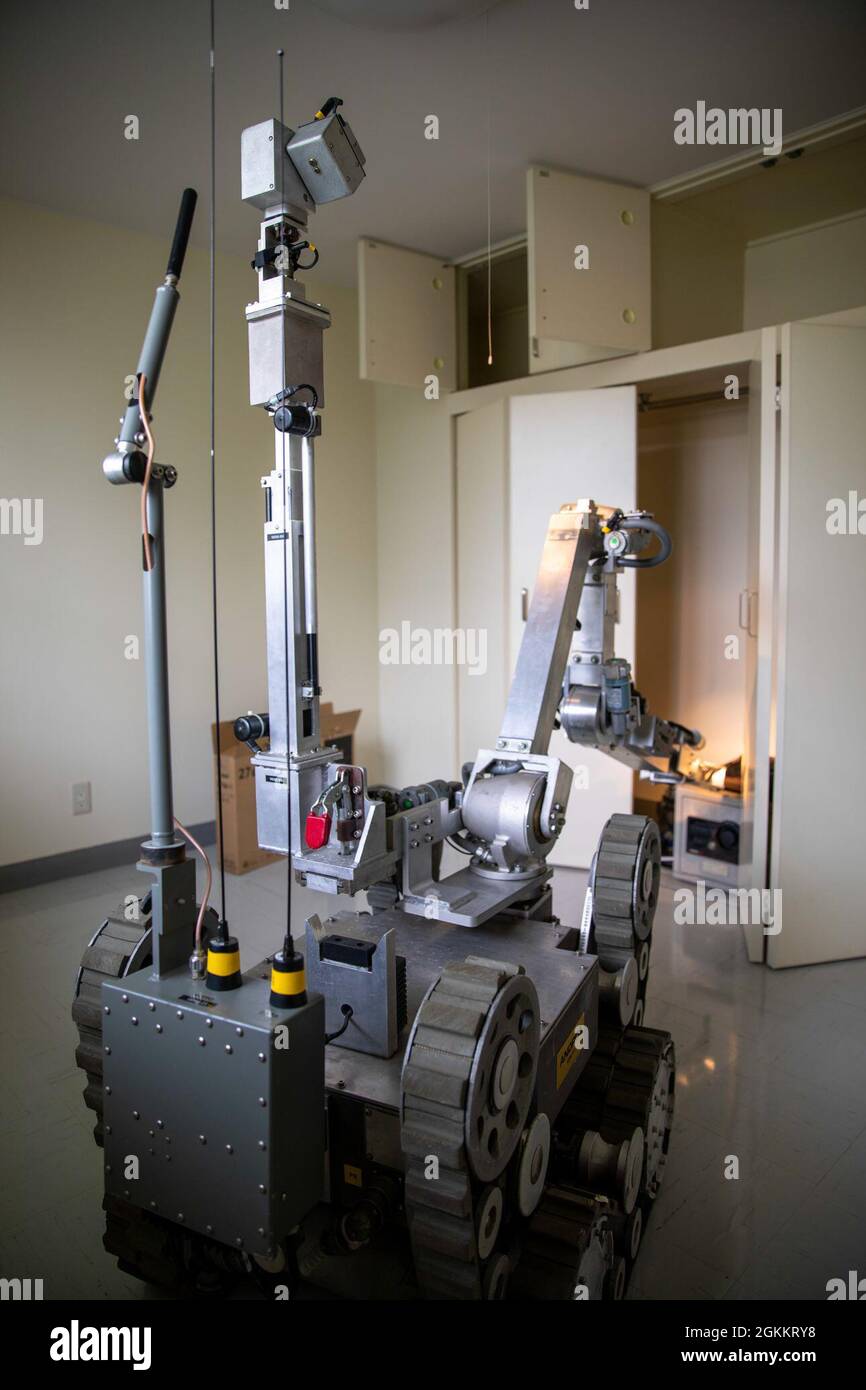 An Explosive Ordnance Disposal (EOD) robot, controlled by a U.S. Marine ...