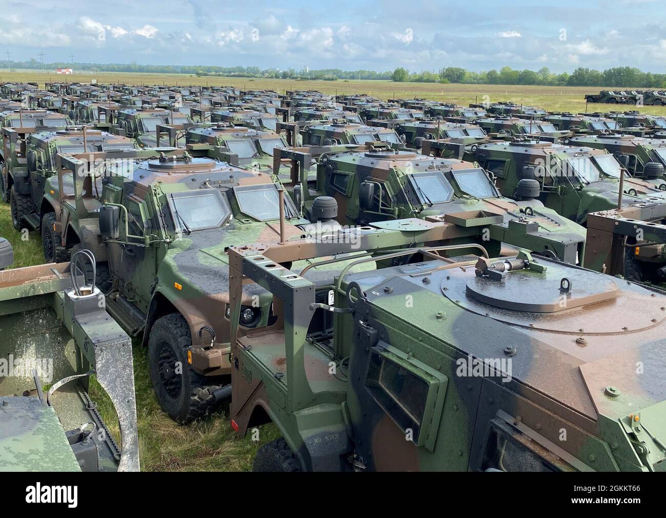 A formation of newly arrived Joint Light Tactical Vehicles lines up at ...