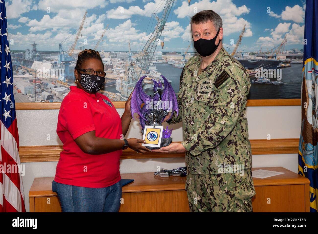 Norfolk Naval Shipyard Executive Officer Capt. Todd Nichols presents ...