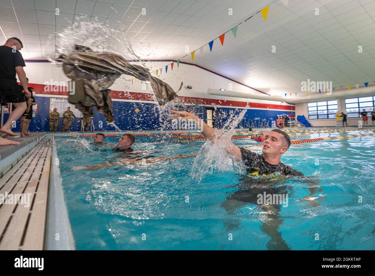 U.S. Army Reserve Soldiers complete the swim event by downgrading their ...