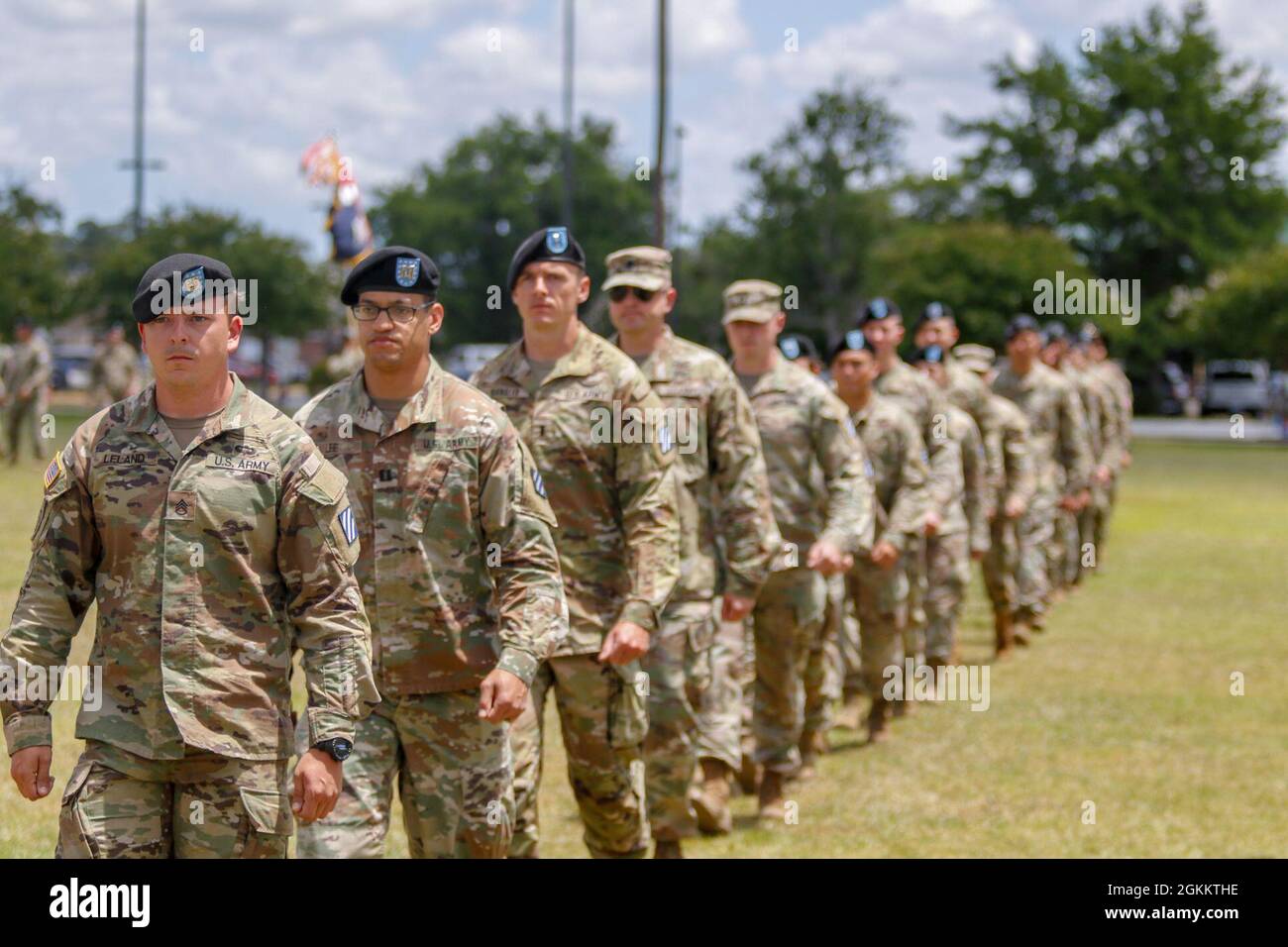Dogface Soldiers from throughout the Division line up to receive their ...