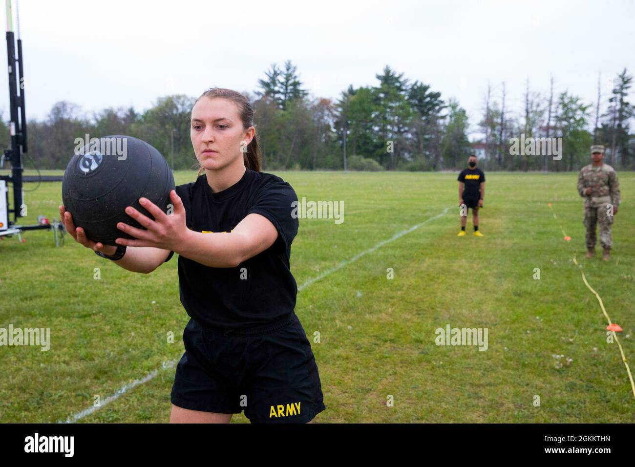 A U.S. Army Reserve Soldier, performs the Standing Power Throw for the ...