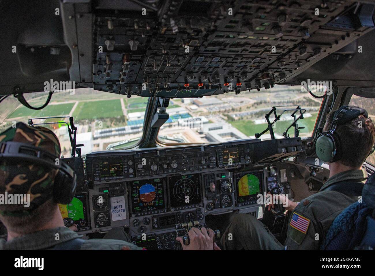 From left, U.S. Air Force Maj. Randall Benson, 97th Training Squadron ...
