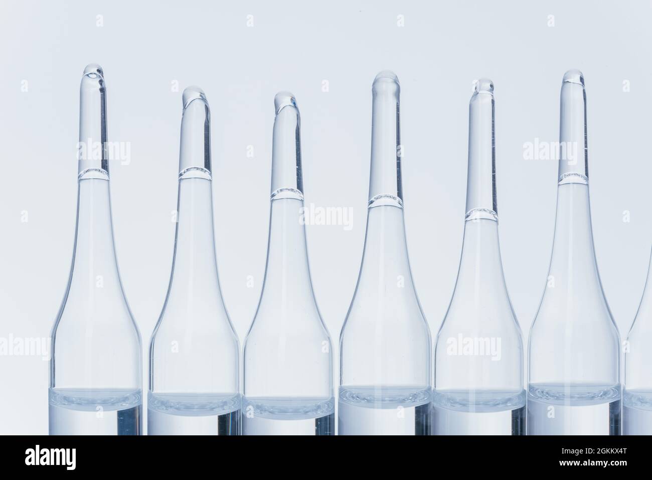 Glass medical ampoule vial for injection. Medicine is dry white drug ...