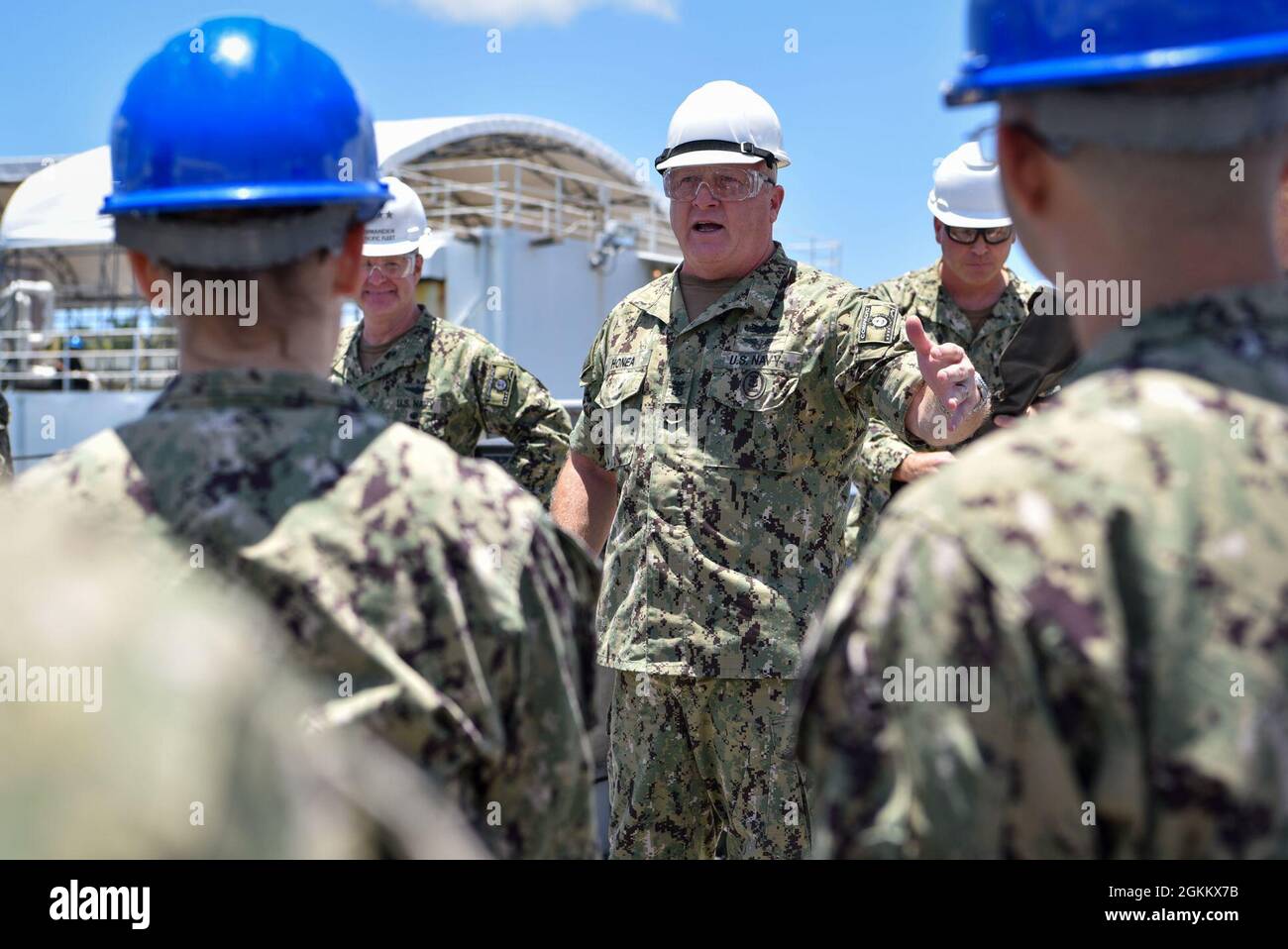 U.S. Pacific Fleet Master Chief Jim Honea delivers remarks to the crew ...