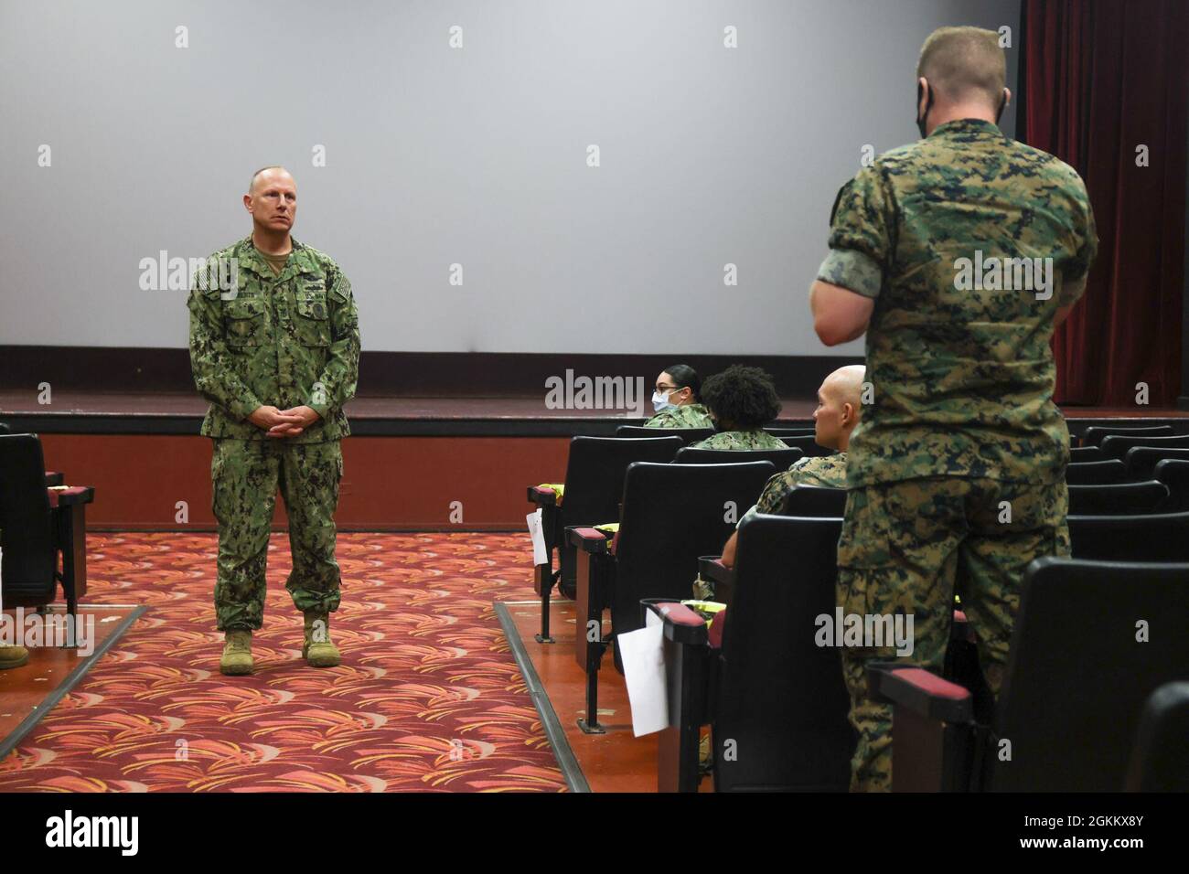 A U.S. Navy Sailor asks a question during a visit by the Navy Force ...