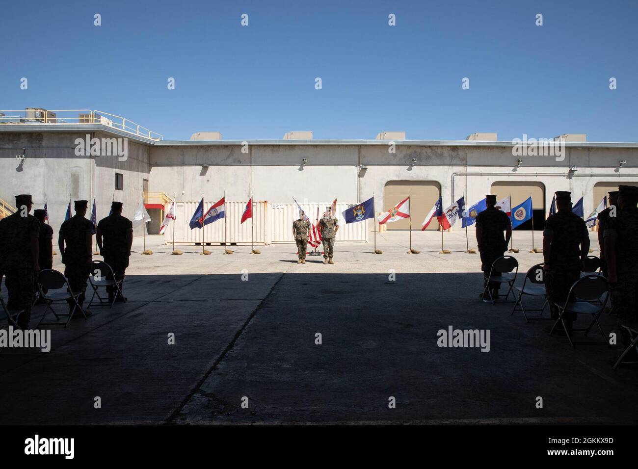 U.S. Marine Corps 1st Sgt. Gustavo A. Farfan (left), the company first ...