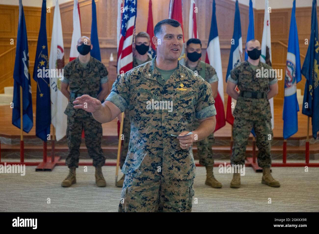 U.S. Marine Corps Lt. Col. Byron Owen delivers his remarks during the ...