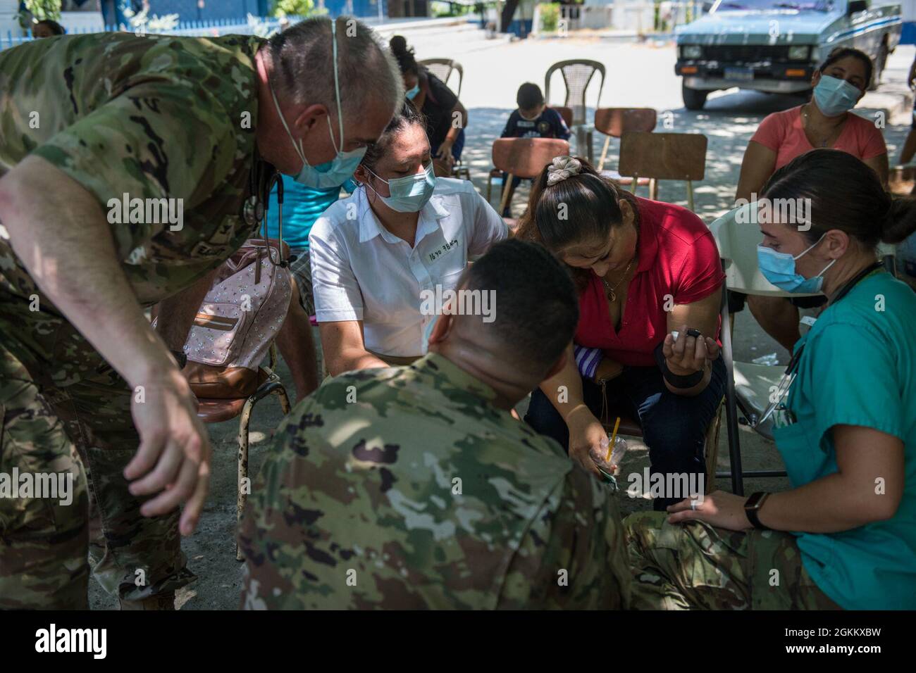 U.S. Army Col. Lance Weagant, left, a medical provider with the Medical ...