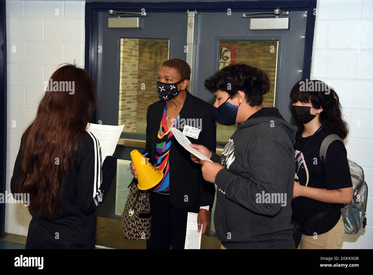 Training and education fleet master chief april beldo talks with hi-res ...