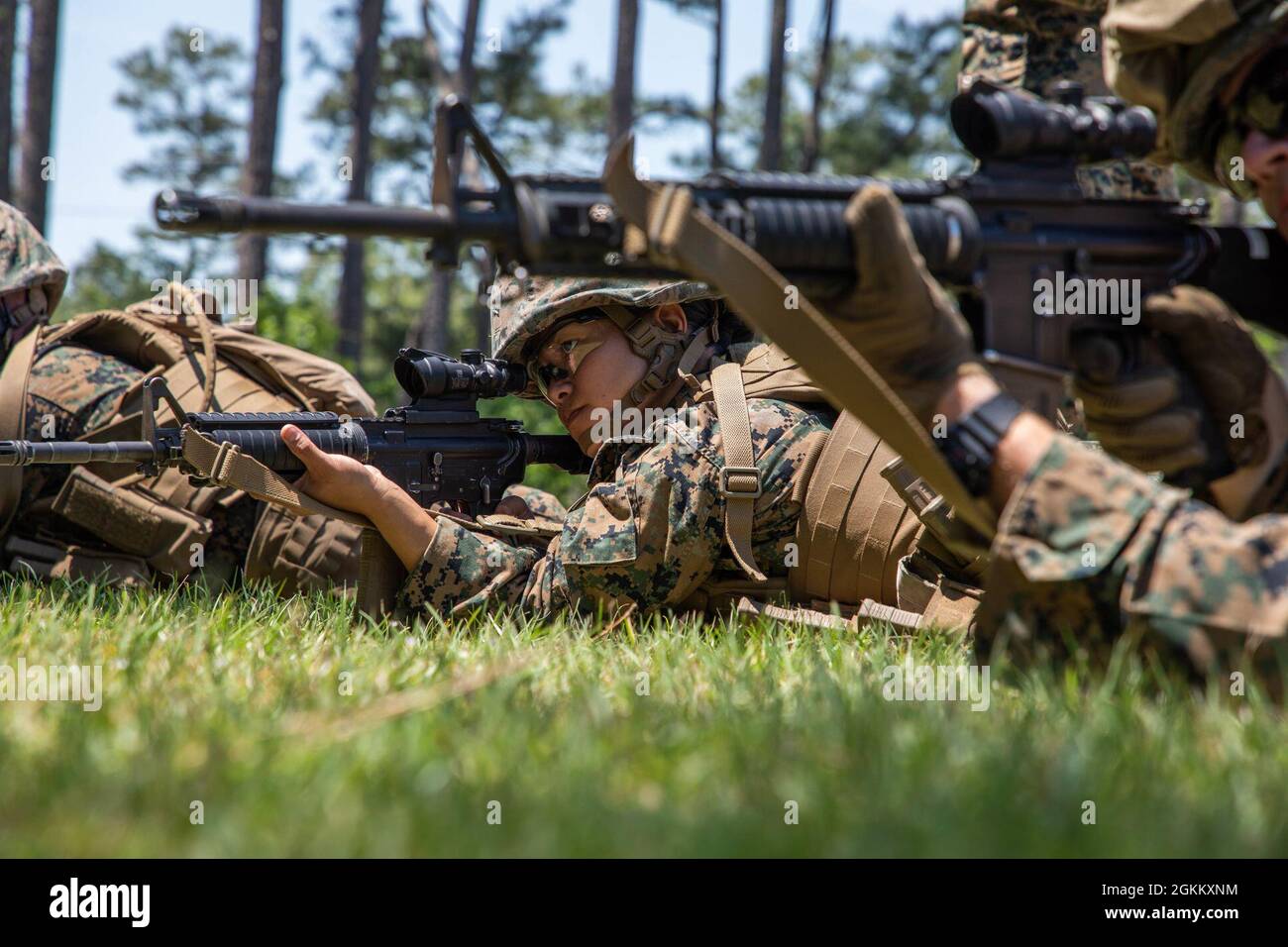 U.S. Marine Corps Lance Cpl. Maryshanine Ecleo, a satellite ...