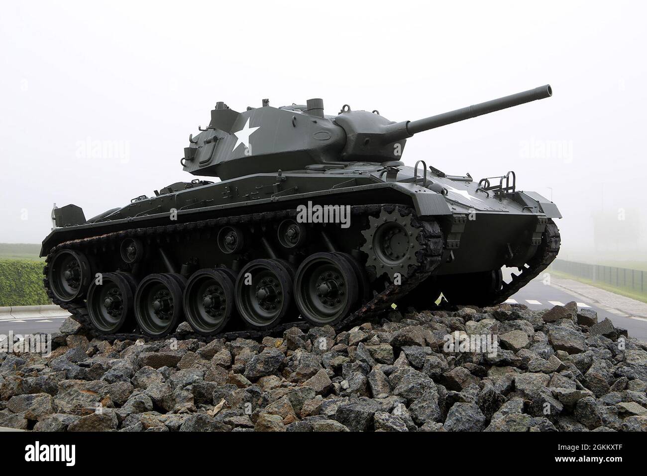 U.S. Army Garrison Benelux personnel install a U.S. Army M24 "Chaffee ...