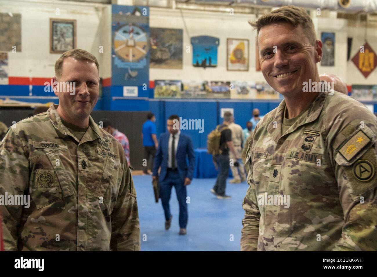 Command Sgt. Maj. Brian Disque, Area Support Group – Kuwait senior enlisted advisor and Lt. Col ...