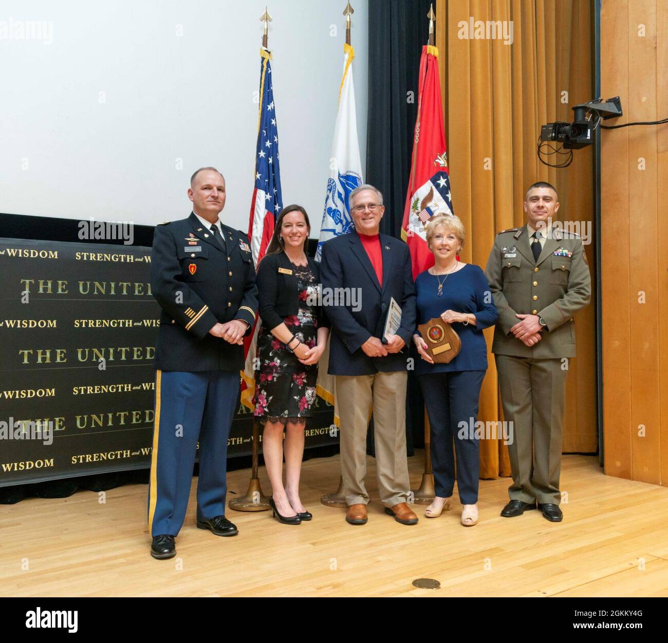 John Tisserand and his, wife, Jeanie stand between Class Vice President ...