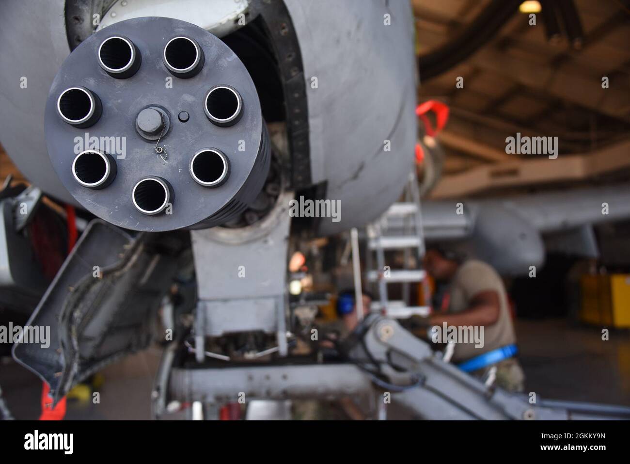 Weapons Airmen from the 354th Aircraft Maintenance Unit load a GAU-8A ...