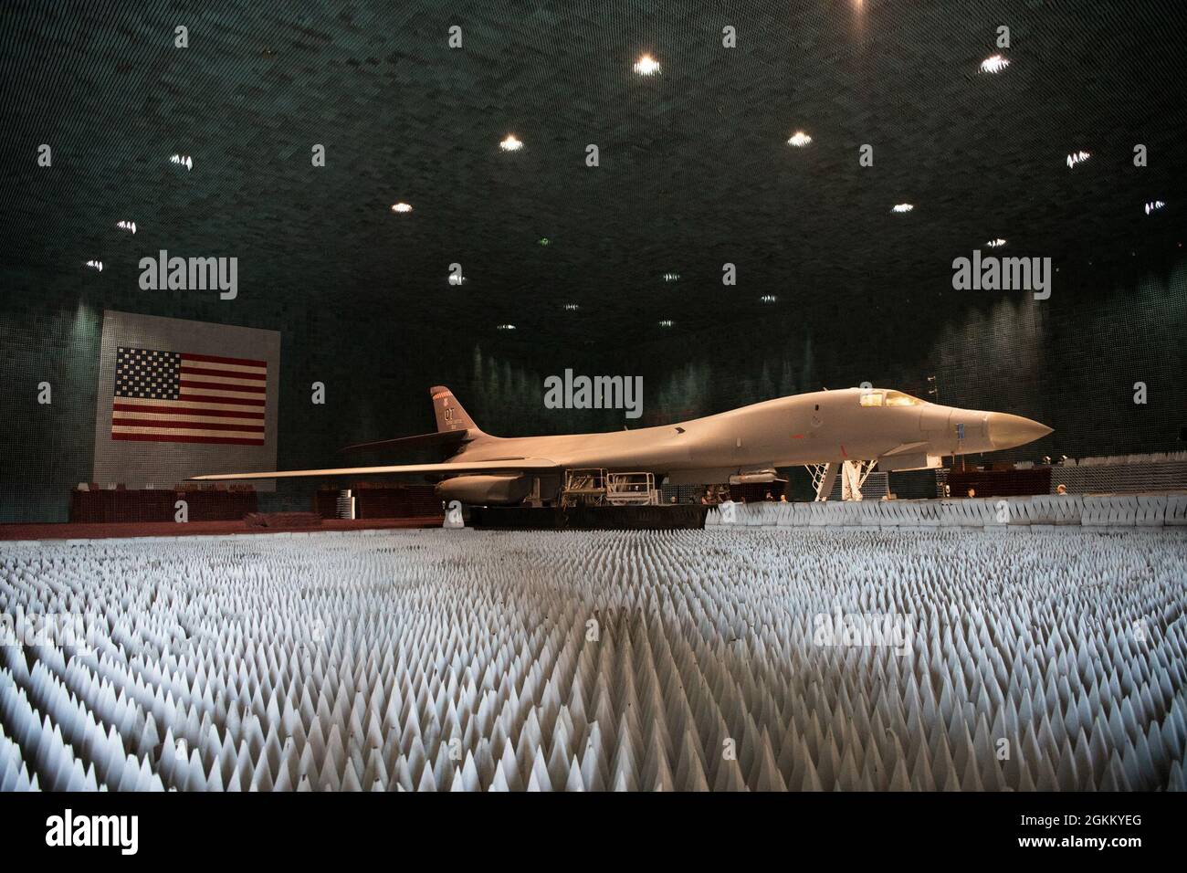 Ground crews move a B-1B Lancer into position at the Benefield Anechoic ...