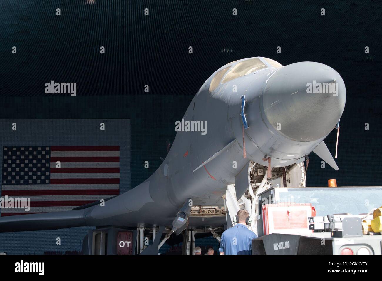 Ground crews move a B-1B Lancer into position at the Benefield Anechoic ...