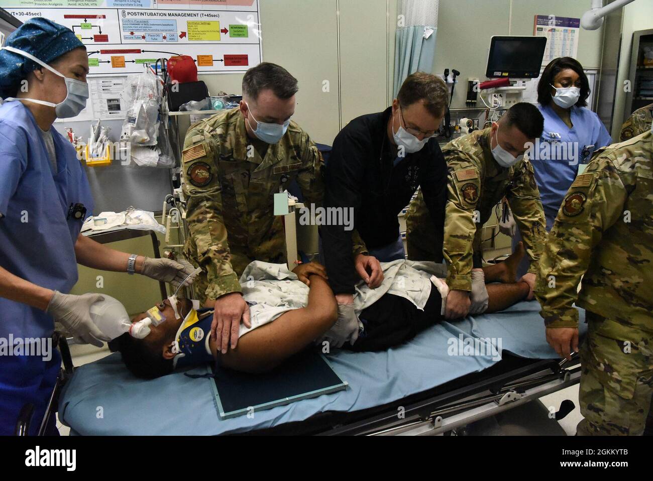 U.S. Air Force Airmen with the 35th Medical Group turn a simulated ...