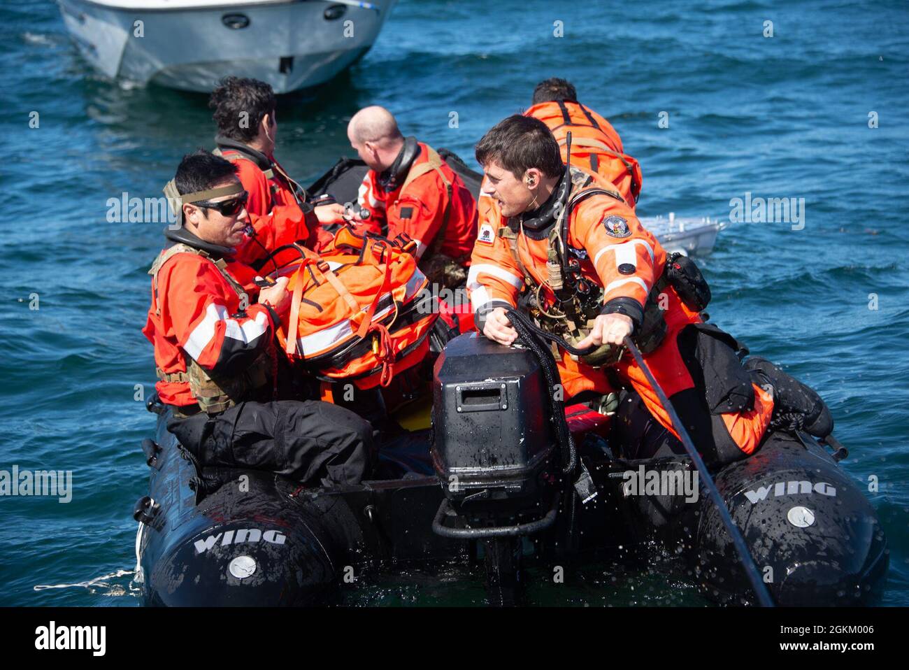 Guardian Angel pararescuemen from the 131st Rescue Squadron parachute ...