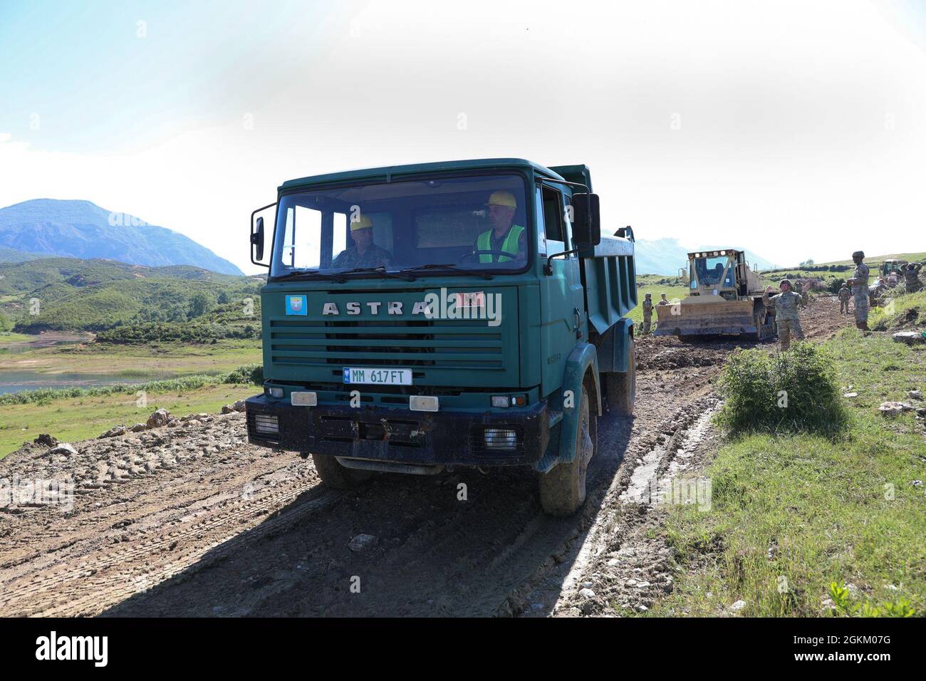 Albanian Army Soldiers receive hand signals from a U.S. Army Soldier ...