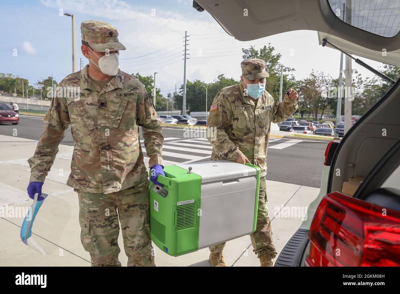 Spc. Juan Colón Otero, left, and Spc. Andrew Roig, Soldiers assigned to ...