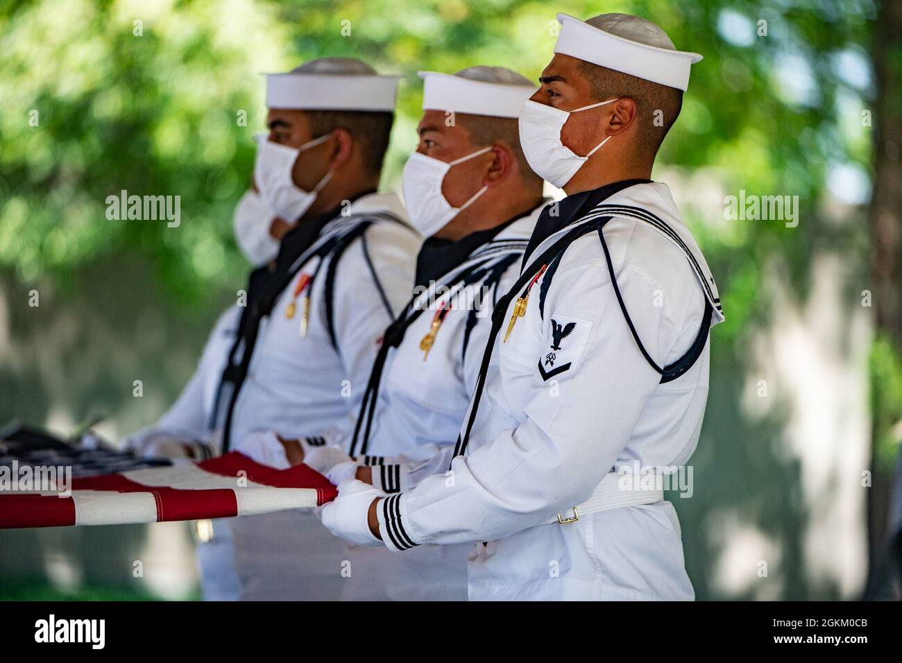 Sailors from the U.S. Navy Ceremonial Guard and a trumpeter from the U.S. Navy Ceremonial Band ...