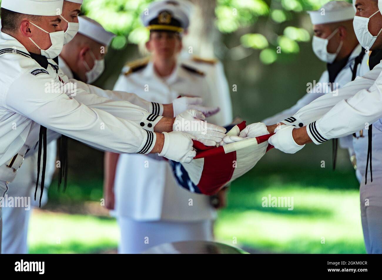 Sailors from the U.S. Navy Ceremonial Guard and a trumpeter from the U.S. Navy Ceremonial Band ...