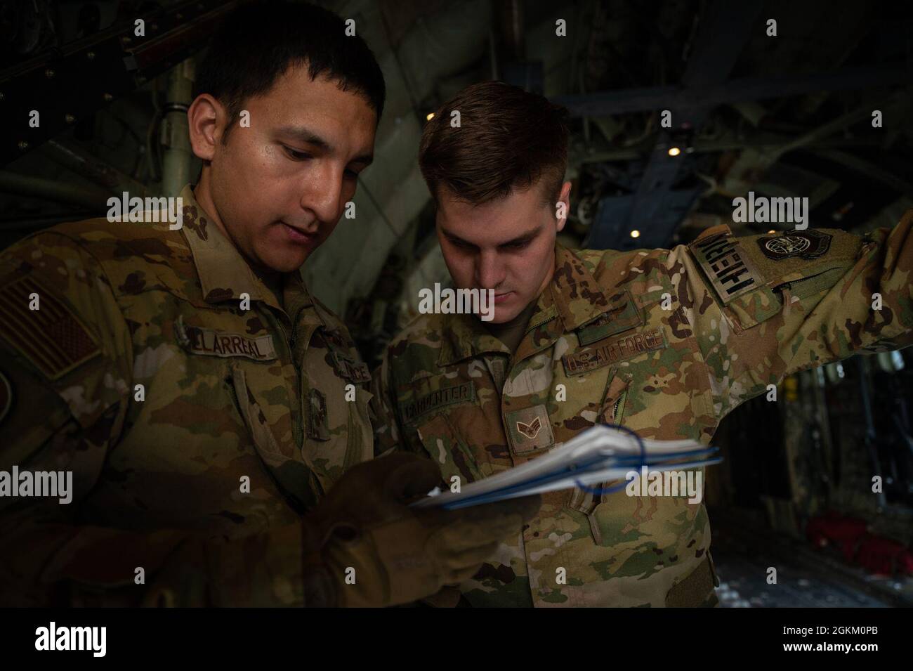 U.S. Air Force Airman 1st Class Jorge Villarreal, left, and U.S. Air ...