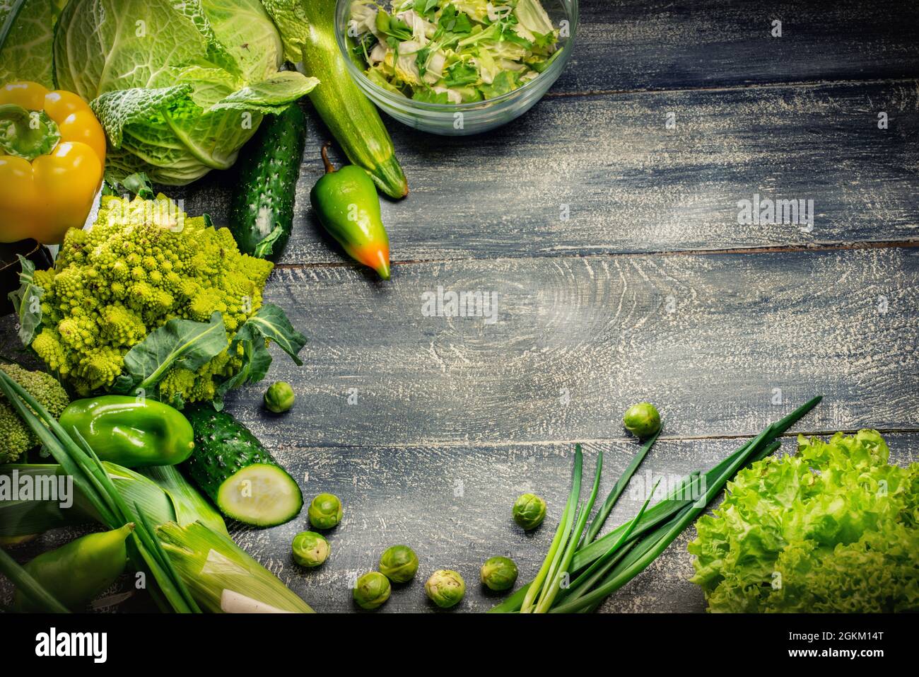 Healthy green fruits and vegetables: lime, kiwi, lettuce, cucumber ...