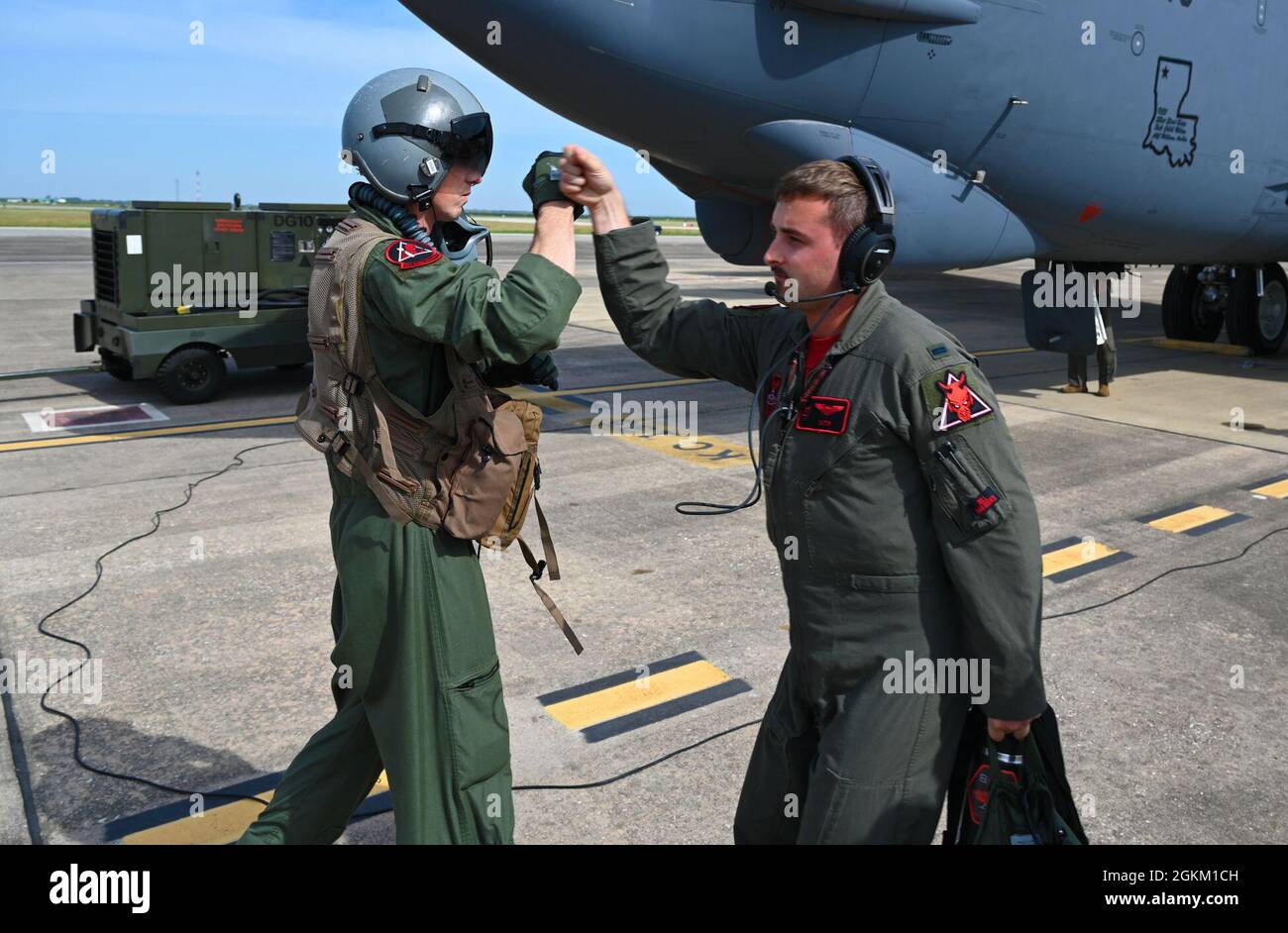 Lt. Col. Christopher “Gov’na” Duff, 96th Bomb Squadron commander, fist ...