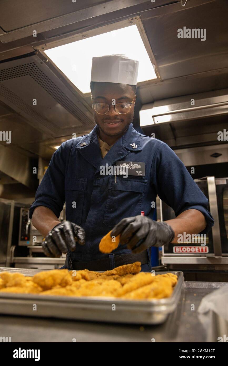 ATLANTIC OCEAN (May 21, 2021) Culinary Specialist 2nd Class Omar White ...