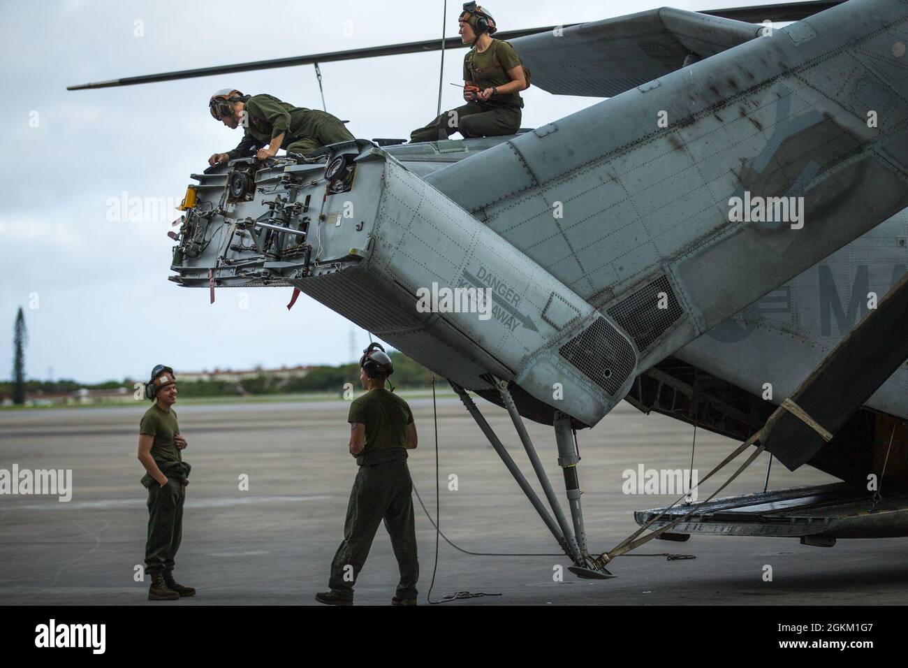 U.S. Marines with Marine Heavy Helicopter Squadron (HMH) 462, work on a ...