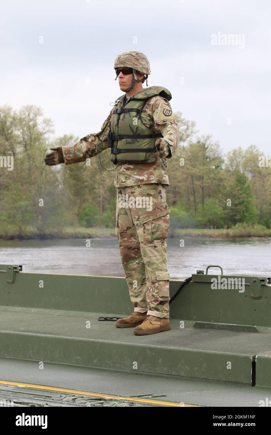 Army Reserve Sgt. Warren Pedersen, raft commander, 652nd Engineer ...