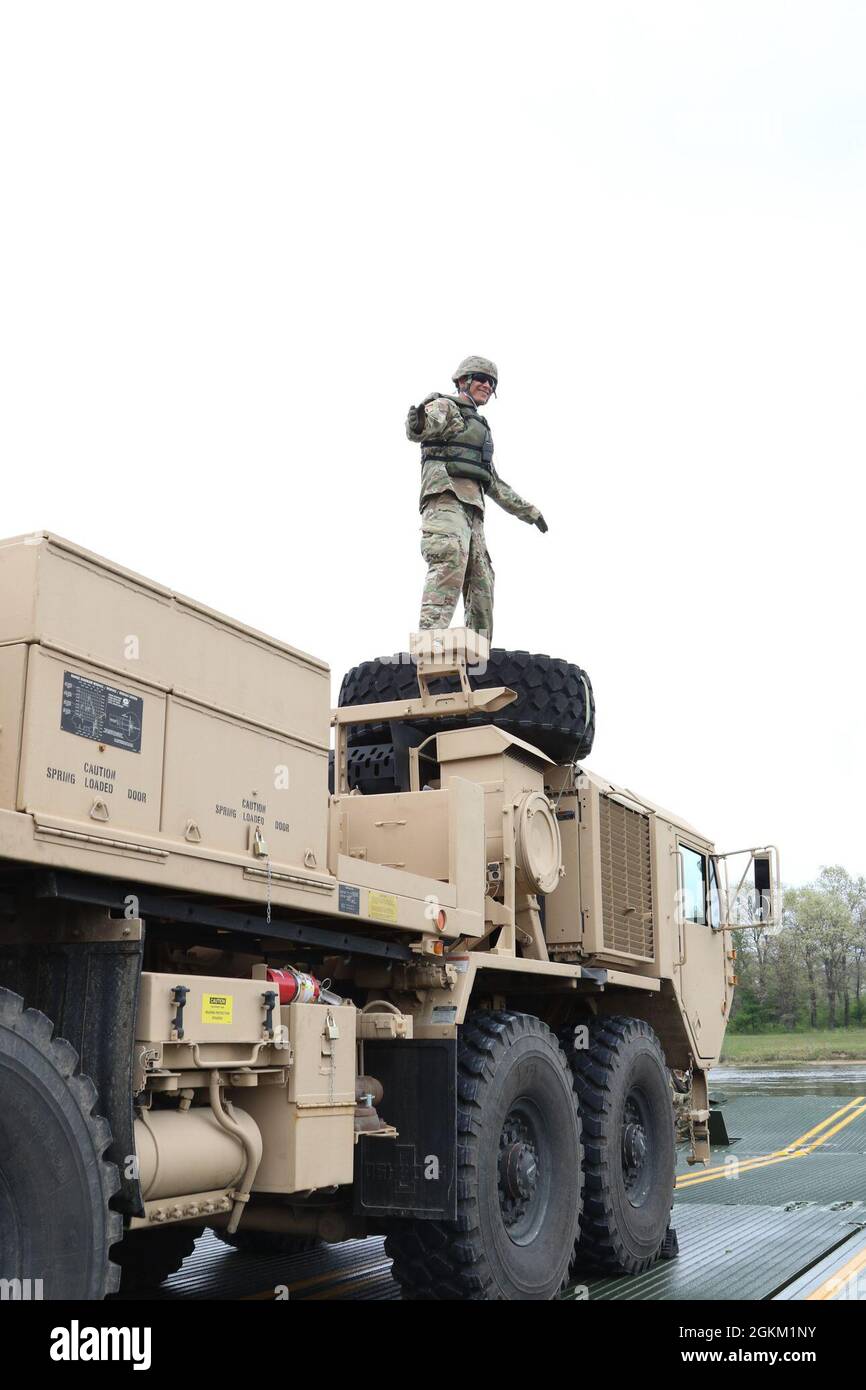 Army Reserve Sgt. Warren Pedersen, raft commander, 652nd Engineer ...