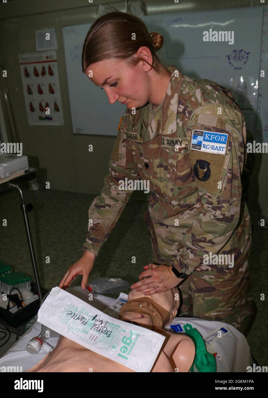 Spc. Jessica Baker, a combat medic specialist with Headquarters ...