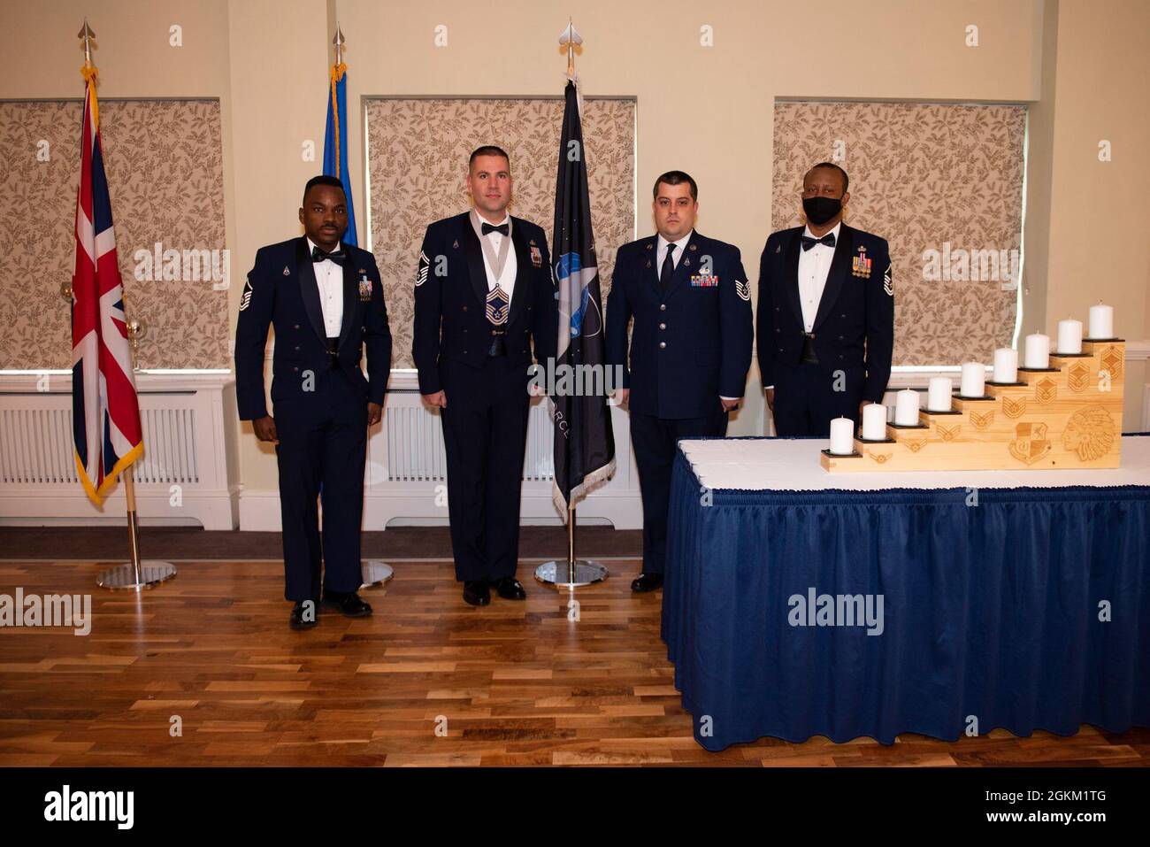 U.S. Space Force Senior Master Sgt. Kyle Mullen, center left, 423rd ...