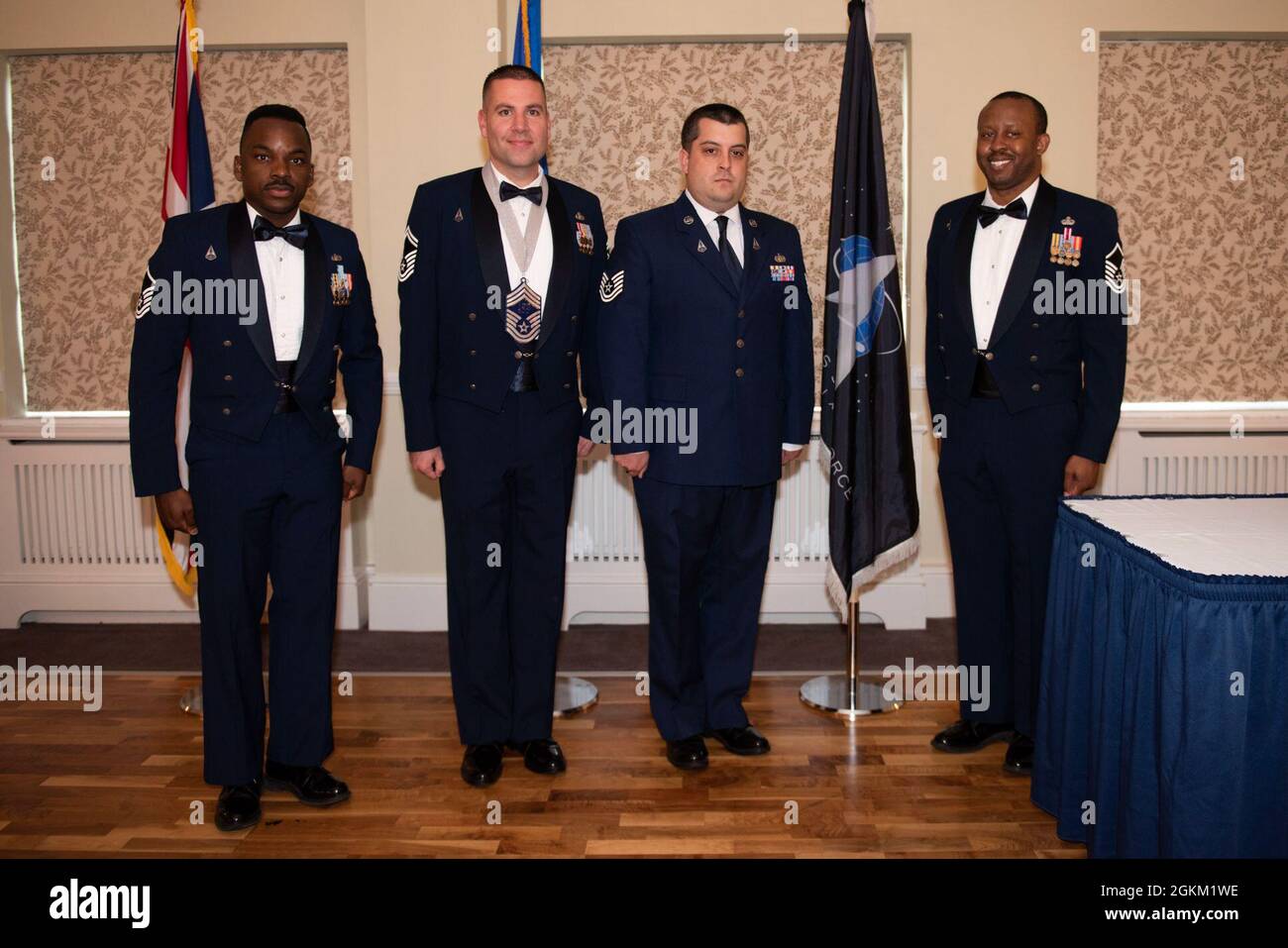 U.S. Space Force Senior Master Sgt. Kyle Mullen, center left, 423rd ...