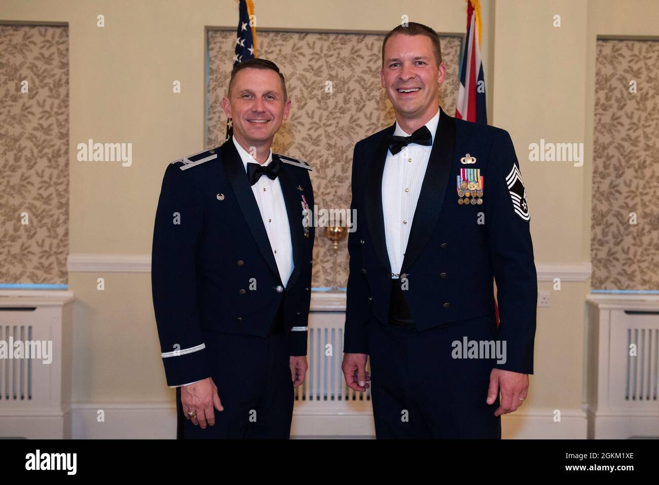 U.S. Air Force Col. Jon Hannah, left, 422nd Air Base Group commander ...