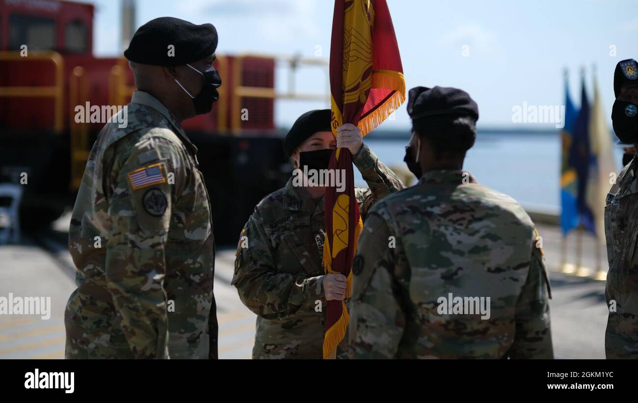 Col. Michael Patrick passes the guidon to Lt. Col. Rebecca D'Angelo ...