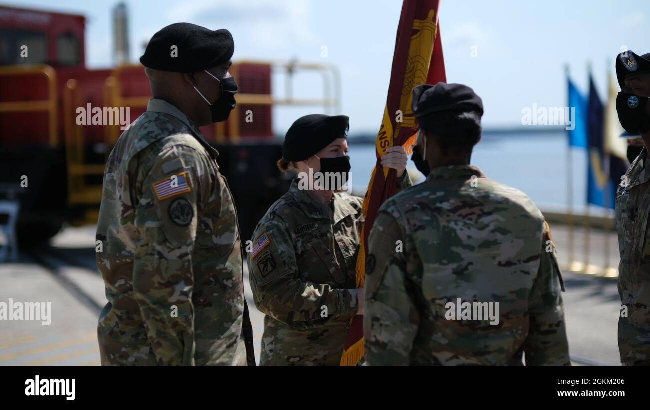 Col. Michael Patrick passes the guidon to Lt. Col. Rebecca D'Angelo ...