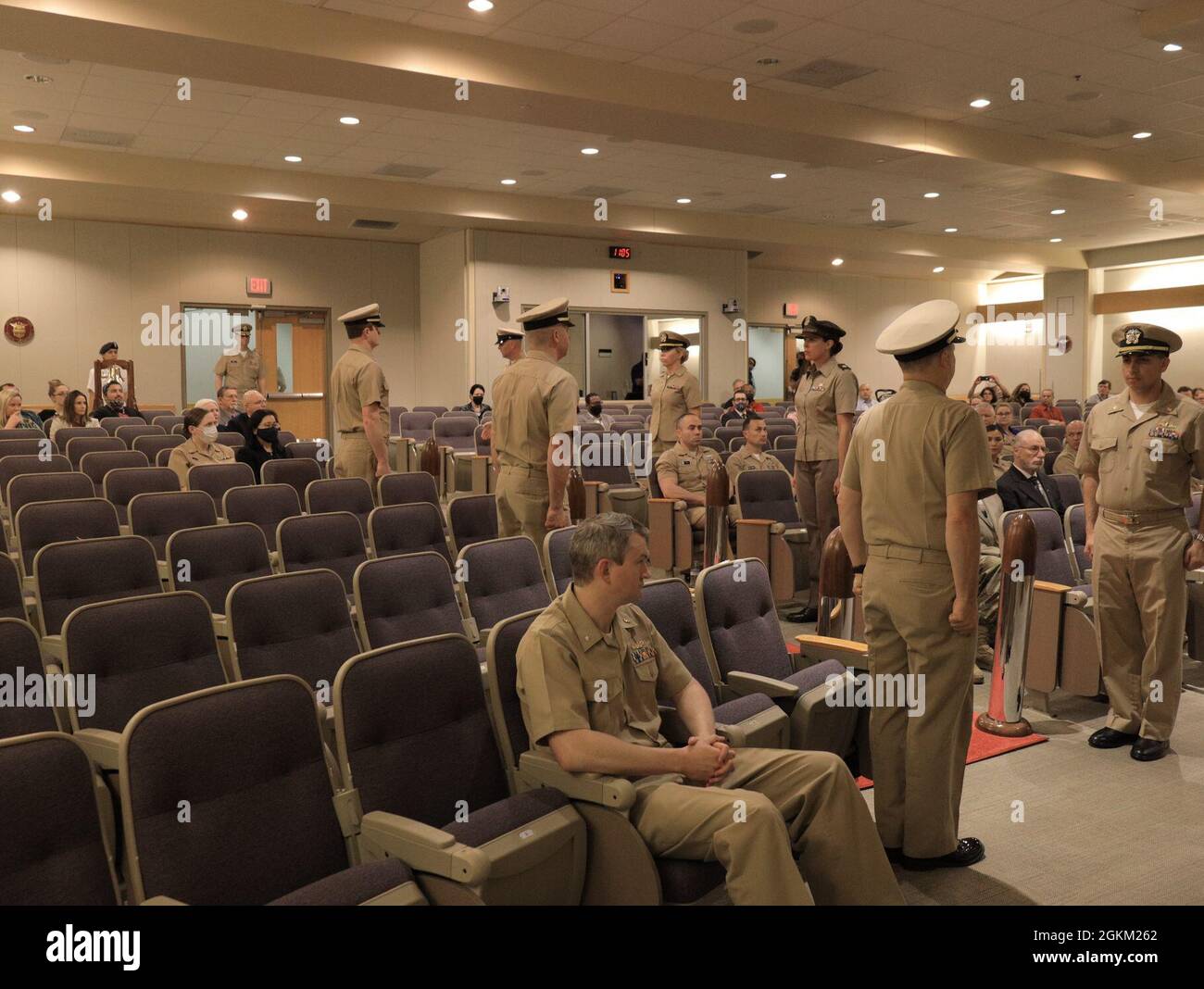 Sideboys stand at attention for the official party's arrival at the ...
