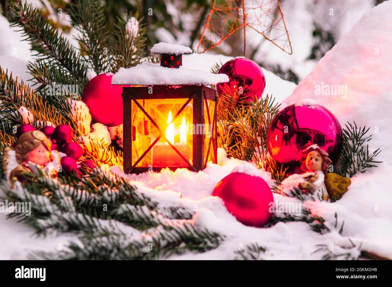 Still life: lantern with candlelight in wintry nature Stock Photo - Alamy